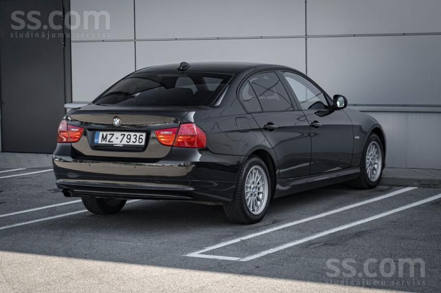Black BMW 318 2010 in Riga, with an engine capacity of 2.00 L and mileage of 304 thousand km for 4990 €, photo 5 on AUTOMOTO.COM.LV