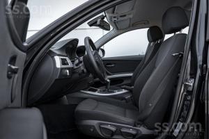 Black BMW 318 2010 in Riga, with an engine capacity of 2.00 L and mileage of 304 thousand km for 4990 €, photo 8 on AUTOMOTO.COM.LV