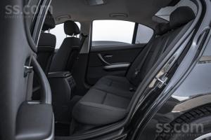 Black BMW 318 2010 in Riga, with an engine capacity of 2.00 L and mileage of 304 thousand km for 4990 €, photo 10 on AUTOMOTO.COM.LV