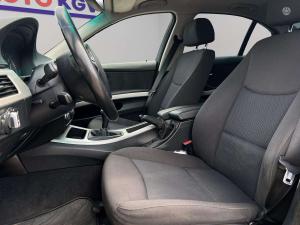 Black BMW 318 2010 in Kaunas, with an engine capacity of 2.00 L and mileage of 287 thousand km for 4999 €, photo 14 on AUTOMOTO.COM.LV