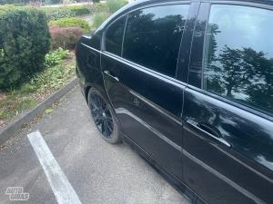 Black BMW 318 2010 in Kaunas, with an engine capacity of 2.00 L and mileage of 280 thousand km for 3900 €, photo 14 on AUTOMOTO.COM.LV