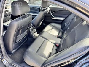Black BMW 318 2011 in Riga, with an engine capacity of 2.00 L and mileage of 330 thousand km for 4490 €, photo 13 on AUTOMOTO.COM.LV