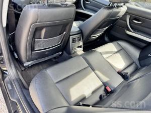 Black BMW 318 2011 in Riga, with an engine capacity of 2.00 L and mileage of 330 thousand km for 4490 €, photo 14 on AUTOMOTO.COM.LV