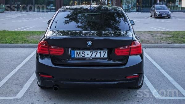 Black BMW 318 2012 in Riga, with an engine capacity of 1.80 L and mileage of 329 thousand km for 7400 €, photo 6 on AUTOMOTO.COM.LV