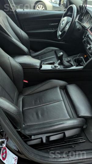 Black BMW 318 2012 in Riga, with an engine capacity of 2.00 L and mileage of 329 thousand km for 7400 €, photo 3 on AUTOMOTO.COM.LV