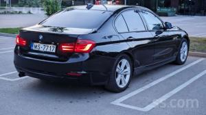 Black BMW 318 2012 in Riga, with an engine capacity of 2.00 L and mileage of 329 thousand km for 7400 €, photo 8 on AUTOMOTO.COM.LV