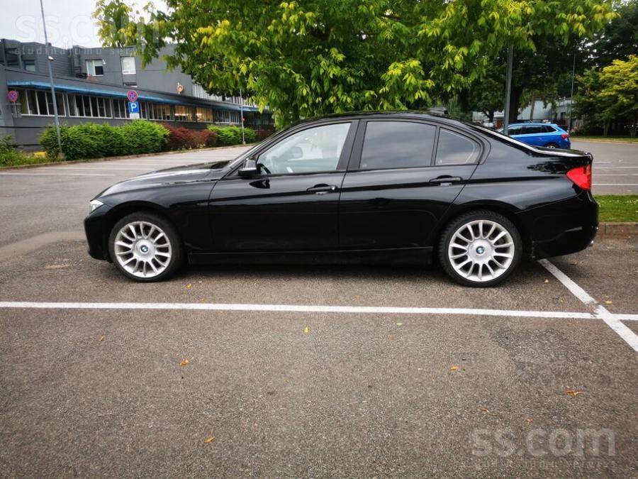 Black BMW 318 2012 in Riga, with an engine capacity of 2.00 L and mileage of 326 thousand km for 8400 €, photo 1 on AUTOMOTO.COM.LV