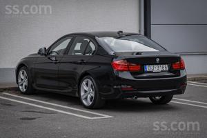 Black BMW 318 2012 in Riga, with an engine capacity of 2.00 L and mileage of 178 thousand km for 8250 €, photo 7 on AUTOMOTO.COM.LV