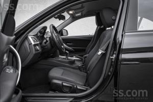 Black BMW 318 2012 in Riga, with an engine capacity of 2.00 L and mileage of 178 thousand km for 8250 €, photo 8 on AUTOMOTO.COM.LV