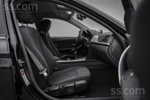 Black BMW 318 2012 in Riga, with an engine capacity of 2.00 L and mileage of 178 thousand km for 8250 €, photo 9 on AUTOMOTO.COM.LV