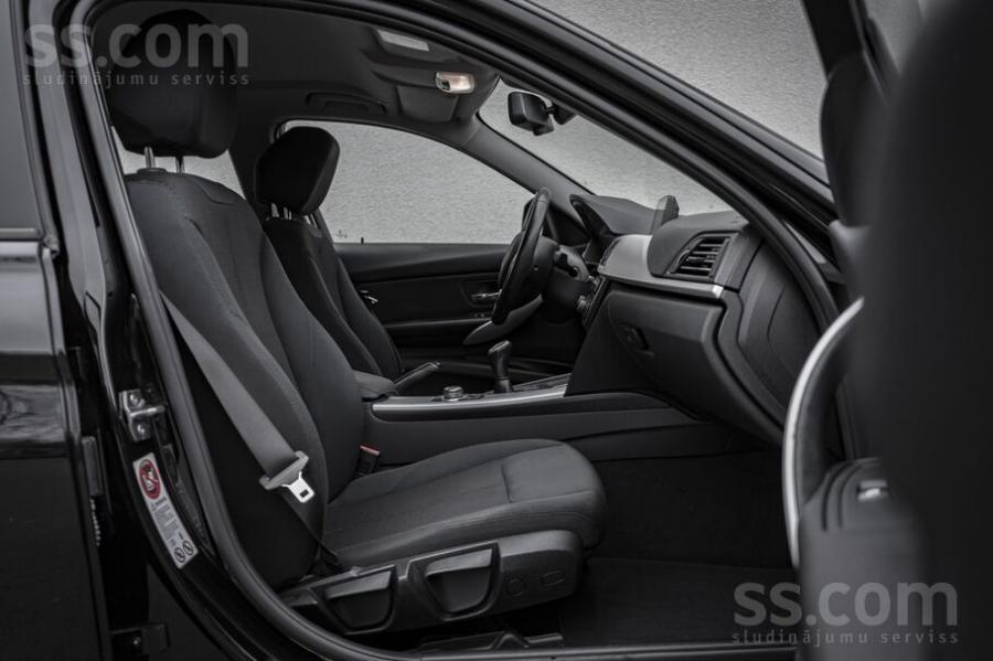 Black BMW 318 2012 in Riga, with an engine capacity of 2.00 L and mileage of 178 thousand km for 8250 €, photo 9 on AUTOMOTO.COM.LV
