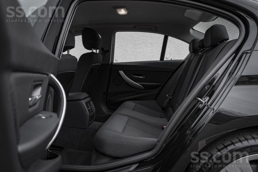 Black BMW 318 2012 in Riga, with an engine capacity of 2.00 L and mileage of 178 thousand km for 8250 €, photo 10 on AUTOMOTO.COM.LV