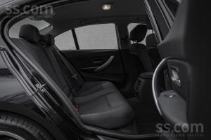 Black BMW 318 2012 in Riga, with an engine capacity of 2.00 L and mileage of 178 thousand km for 8250 €, photo 11 on AUTOMOTO.COM.LV