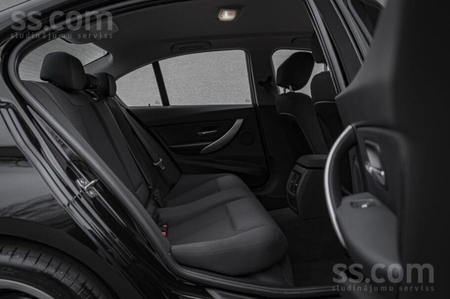 Black BMW 318 2012 in Riga, with an engine capacity of 2.00 L and mileage of 178 thousand km for 8250 €, photo 11 on AUTOMOTO.COM.LV