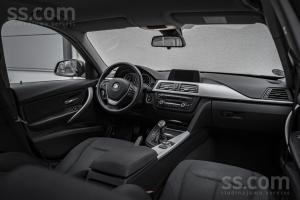Black BMW 318 2012 in Riga, with an engine capacity of 2.00 L and mileage of 178 thousand km for 8250 €, photo 14 on AUTOMOTO.COM.LV