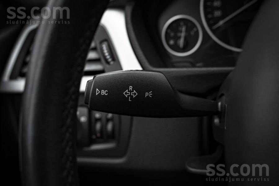Black BMW 318 2012 in Riga, with an engine capacity of 2.00 L and mileage of 178 thousand km for 8250 €, photo 15 on AUTOMOTO.COM.LV