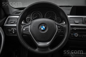 Black BMW 318 2012 in Riga, with an engine capacity of 2.00 L and mileage of 178 thousand km for 8250 €, photo 17 on AUTOMOTO.COM.LV