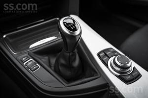 Black BMW 318 2012 in Riga, with an engine capacity of 2.00 L and mileage of 178 thousand km for 8250 €, photo 21 on AUTOMOTO.COM.LV