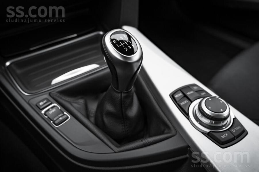 Black BMW 318 2012 in Riga, with an engine capacity of 2.00 L and mileage of 178 thousand km for 8250 €, photo 21 on AUTOMOTO.COM.LV