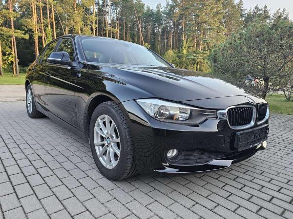 Black BMW 318 2012 in Ukmerge, with an engine capacity of 2.00 L and mileage of 301 thousand km for 6200 €, photo 1 on AUTOMOTO.COM.LV