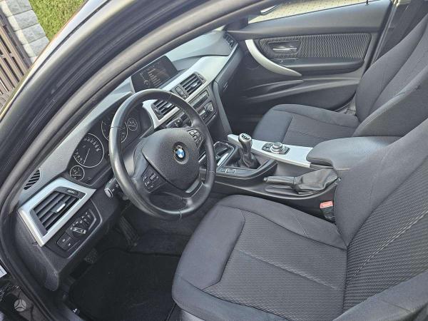 Black BMW 318 2012 in Ukmerge, with an engine capacity of 2.00 L and mileage of 301 thousand km for 6200 €, photo 4 on AUTOMOTO.COM.LV