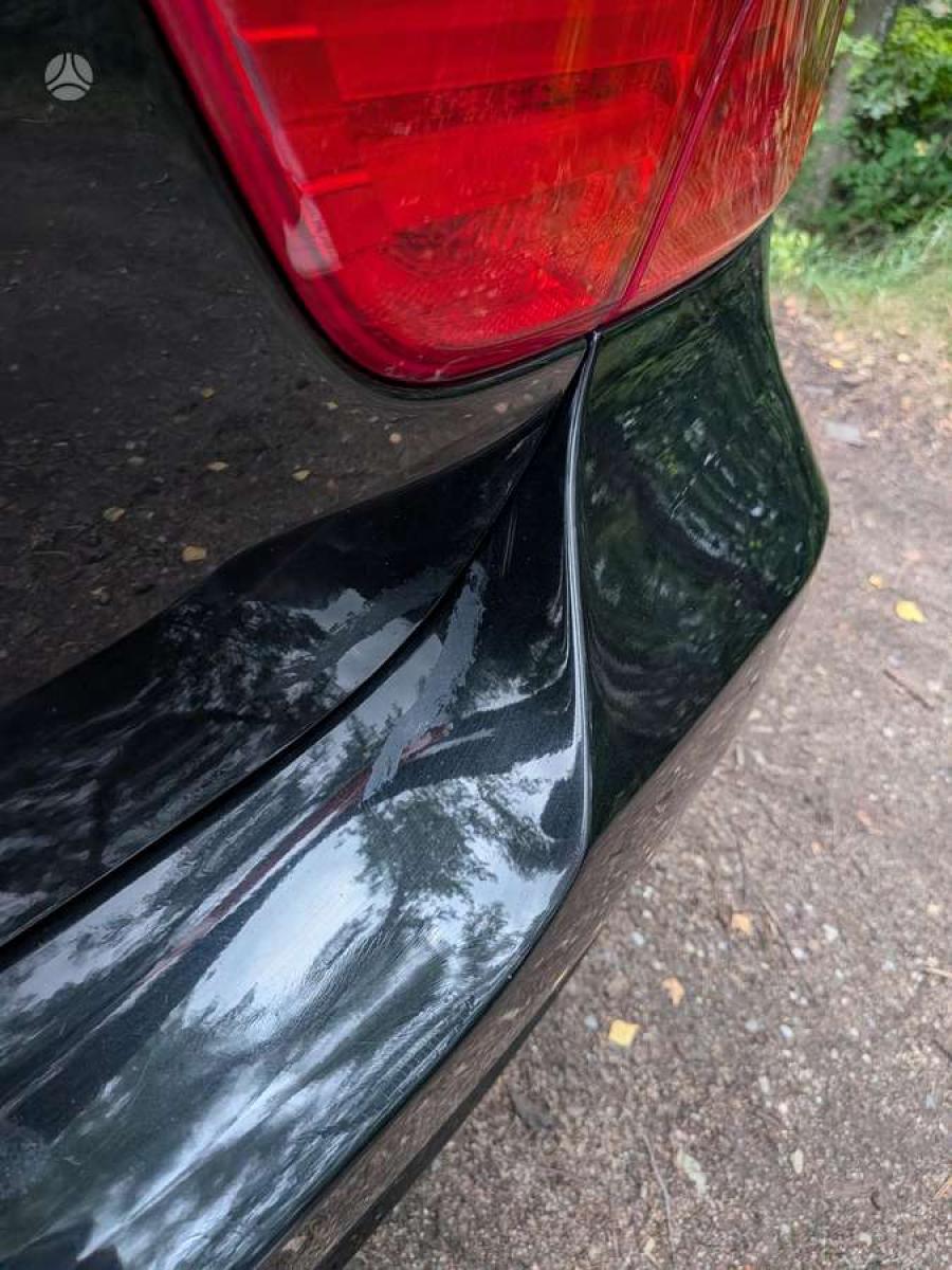 Black BMW 318 2012 in Kaunas, with an engine capacity of 2.00 L and mileage of 292 thousand km for 4900 €, photo 24 on AUTOMOTO.COM.LV