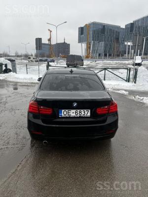Black BMW 318 2013 in Riga, with an engine capacity of 2.00 L and mileage of 207 thousand km for 10400 €, photo 2 on AUTOMOTO.COM.LV