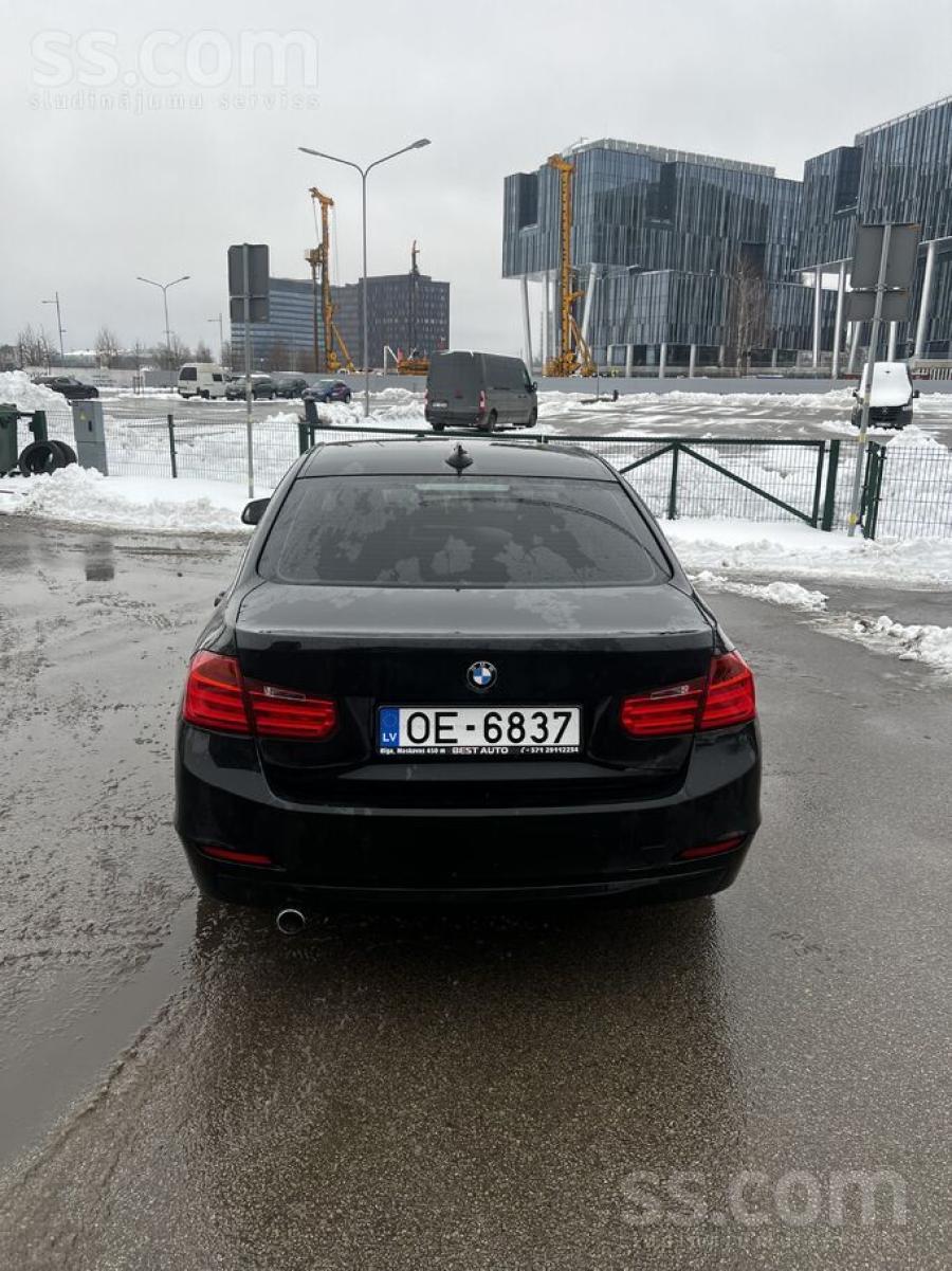 Black BMW 318 2013 in Riga, with an engine capacity of 2.00 L and mileage of 207 thousand km for 10400 €, photo 2 on AUTOMOTO.COM.LV