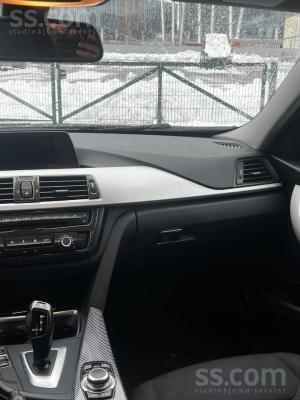 Black BMW 318 2013 in Riga, with an engine capacity of 2.00 L and mileage of 207 thousand km for 10400 €, photo 11 on AUTOMOTO.COM.LV