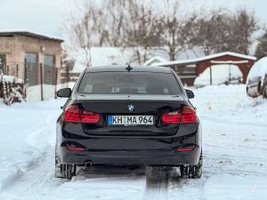 Black BMW 318 2013 in Siauliai, with an engine capacity of 0.00 L and mileage of 231 thousand km for 7200 €, photo 7 on AUTOMOTO.COM.LV
