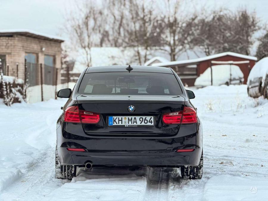 Black BMW 318 2013 in Siauliai, with an engine capacity of 0.00 L and mileage of 231 thousand km for 7200 €, photo 7 on AUTOMOTO.COM.LV