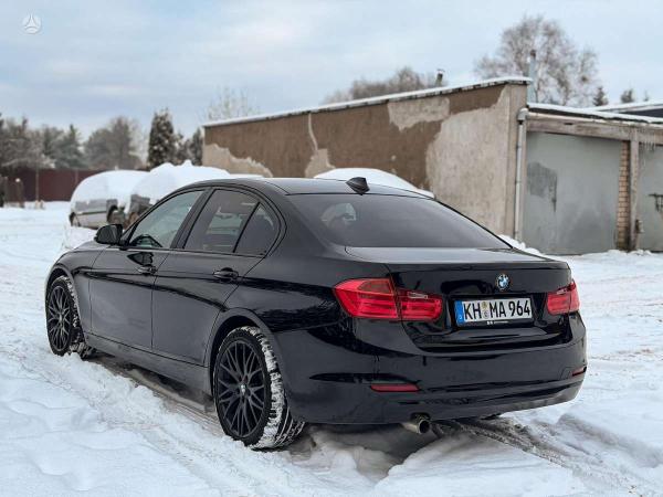Black BMW 318 2013 in Siauliai, with an engine capacity of 0.00 L and mileage of 231 thousand km for 7200 €, photo 8 on AUTOMOTO.COM.LV