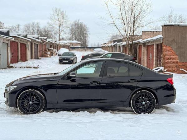 Black BMW 318 2013 in Siauliai, with an engine capacity of 0.00 L and mileage of 231 thousand km for 7200 €, photo 9 on AUTOMOTO.COM.LV