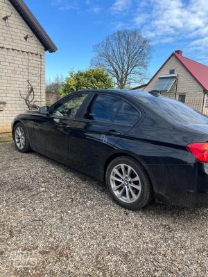 Black BMW 318 2013 in Akmene, with an engine capacity of 2.00 L and mileage of 277 thousand km for 8200 €, photo 3 on AUTOMOTO.COM.LV