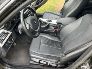 Black BMW 318 2013 in Riga, with an engine capacity of 2.00 L and mileage of 250 thousand km for 7000 €, photo 12 on AUTOMOTO.COM.LV