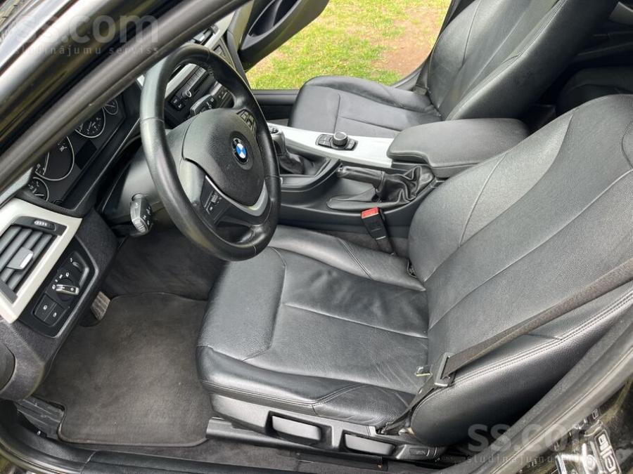 Black BMW 318 2013 in Riga, with an engine capacity of 2.00 L and mileage of 250 thousand km for 7000 €, photo 12 on AUTOMOTO.COM.LV