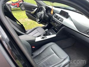 Black BMW 318 2013 in Riga, with an engine capacity of 2.00 L and mileage of 250 thousand km for 7000 €, photo 13 on AUTOMOTO.COM.LV