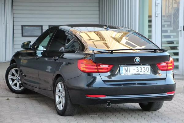 Black BMW 318 2013 in Marupe, with an engine capacity of 2.00 L and mileage of 275 thousand km for 12550 €, photo 7 on AUTOMOTO.COM.LV
