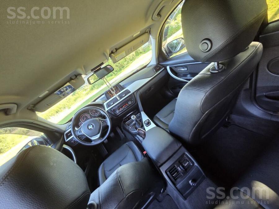 Black BMW 318 2013 in Riga, with an engine capacity of 2.00 L and mileage of 251 thousand km for 8000 €, photo 11 on AUTOMOTO.COM.LV