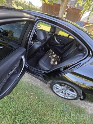 Black BMW 318 2013 in Riga, with an engine capacity of 2.00 L and mileage of 251 thousand km for 8000 €, photo 12 on AUTOMOTO.COM.LV