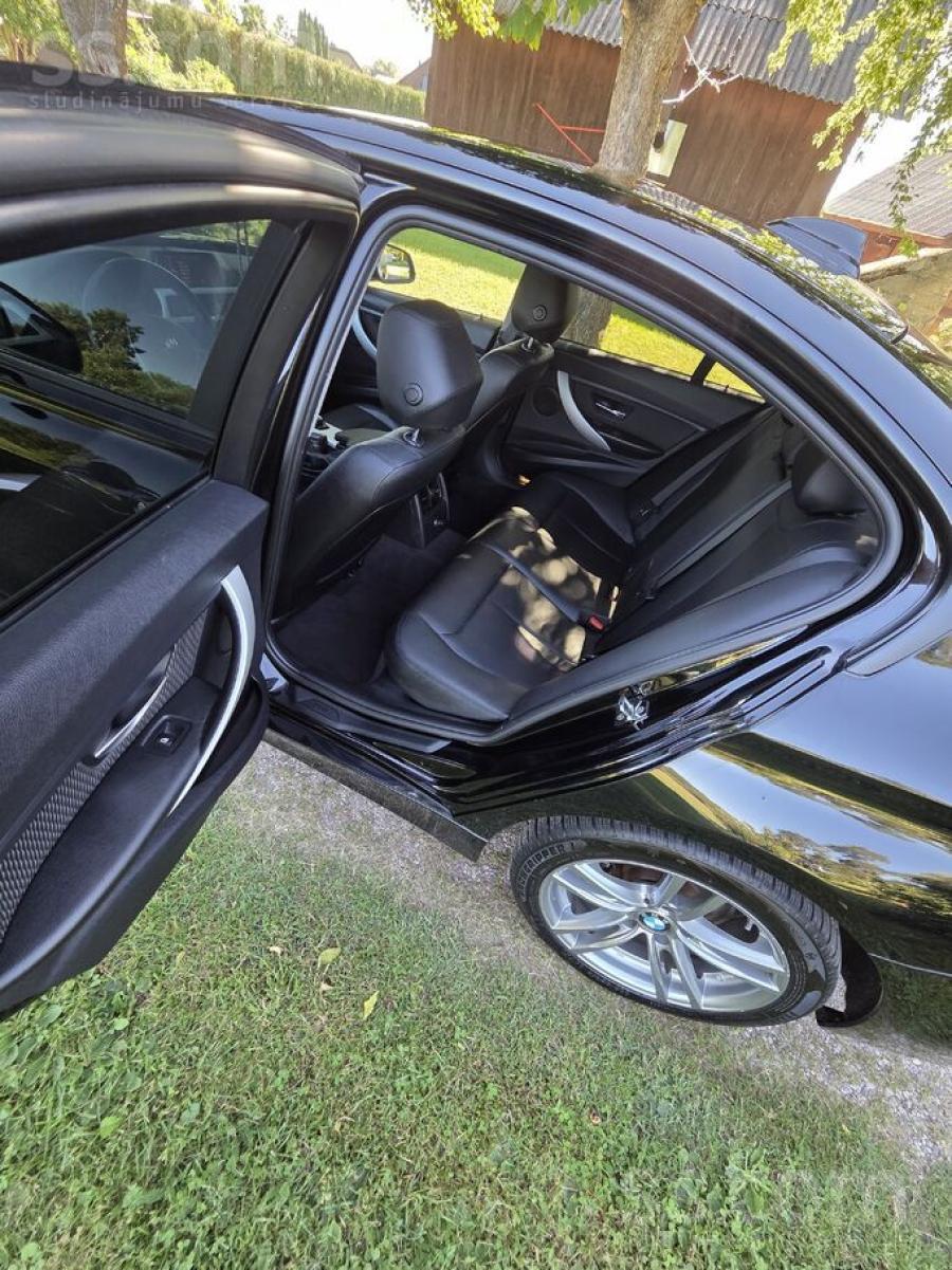 Black BMW 318 2013 in Riga, with an engine capacity of 2.00 L and mileage of 251 thousand km for 8000 €, photo 12 on AUTOMOTO.COM.LV