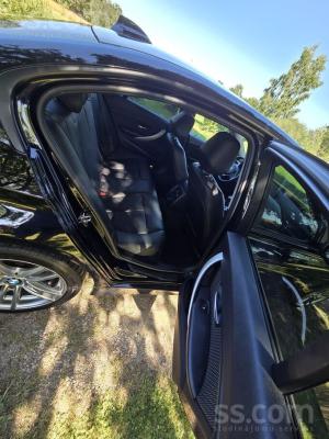 Black BMW 318 2013 in Riga, with an engine capacity of 2.00 L and mileage of 251 thousand km for 8000 €, photo 15 on AUTOMOTO.COM.LV