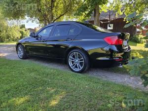 Black BMW 318 2013 in Riga, with an engine capacity of 2.00 L and mileage of 251 thousand km for 8000 €, photo 23 on AUTOMOTO.COM.LV