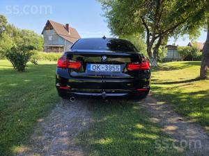 Black BMW 318 2013 in Riga, with an engine capacity of 2.00 L and mileage of 251 thousand km for 8000 €, photo 26 on AUTOMOTO.COM.LV