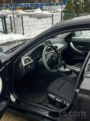 Black BMW 318 2013 in Riga, with an engine capacity of 2.00 L and mileage of 212 thousand km for 9150 €, photo 7 on AUTOMOTO.COM.LV