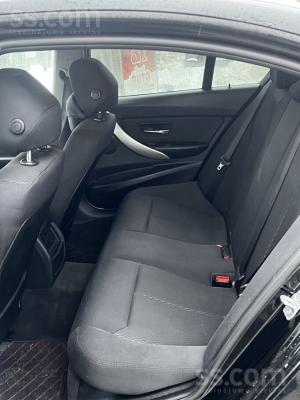 Black BMW 318 2013 in Riga, with an engine capacity of 2.00 L and mileage of 212 thousand km for 9150 €, photo 8 on AUTOMOTO.COM.LV