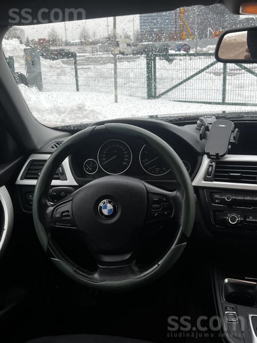 Black BMW 318 2013 in Riga, with an engine capacity of 2.00 L and mileage of 212 thousand km for 9150 €, photo 10 on AUTOMOTO.COM.LV