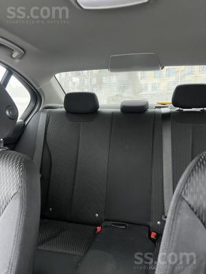 Black BMW 318 2013 in Riga, with an engine capacity of 2.00 L and mileage of 212 thousand km for 9150 €, photo 12 on AUTOMOTO.COM.LV