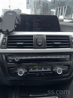 Black BMW 318 2013 in Riga, with an engine capacity of 2.00 L and mileage of 212 thousand km for 9150 €, photo 13 on AUTOMOTO.COM.LV