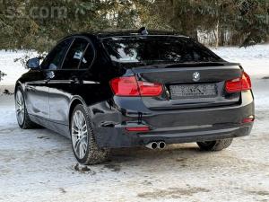 Black BMW 318 2014 in Jelgava, with an engine capacity of 2.00 L and mileage of 243 thousand km for 10800 €, photo 4 on AUTOMOTO.COM.LV